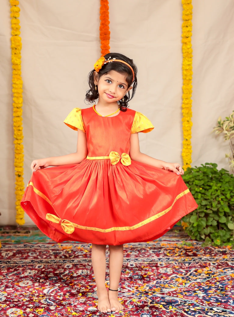 Orange Raw silk dress with yellow brocade sleeves and bow highlights f ...